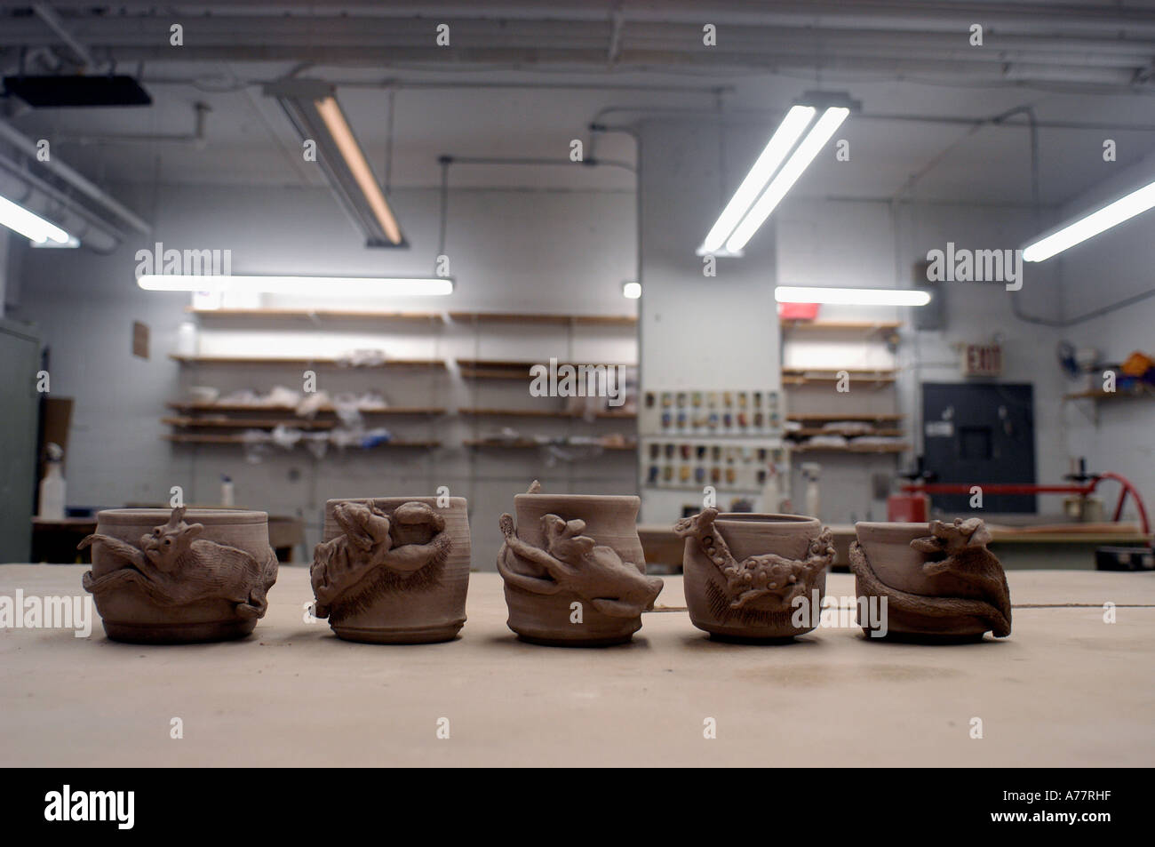 Display of ceramic mugs in a ceramics studio Stock Photo - Alamy