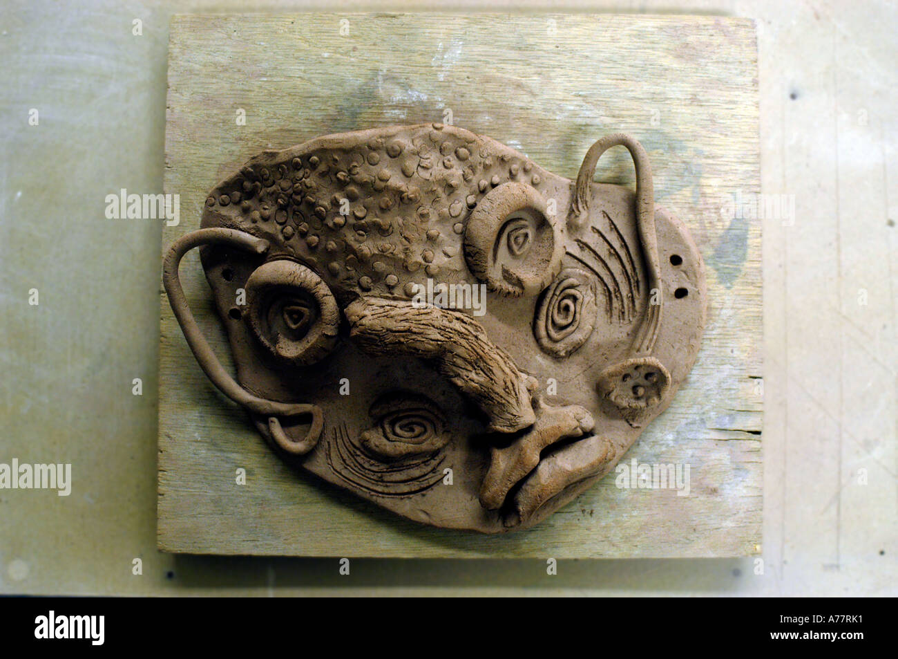 Display of a ceramic mask Stock Photo - Alamy