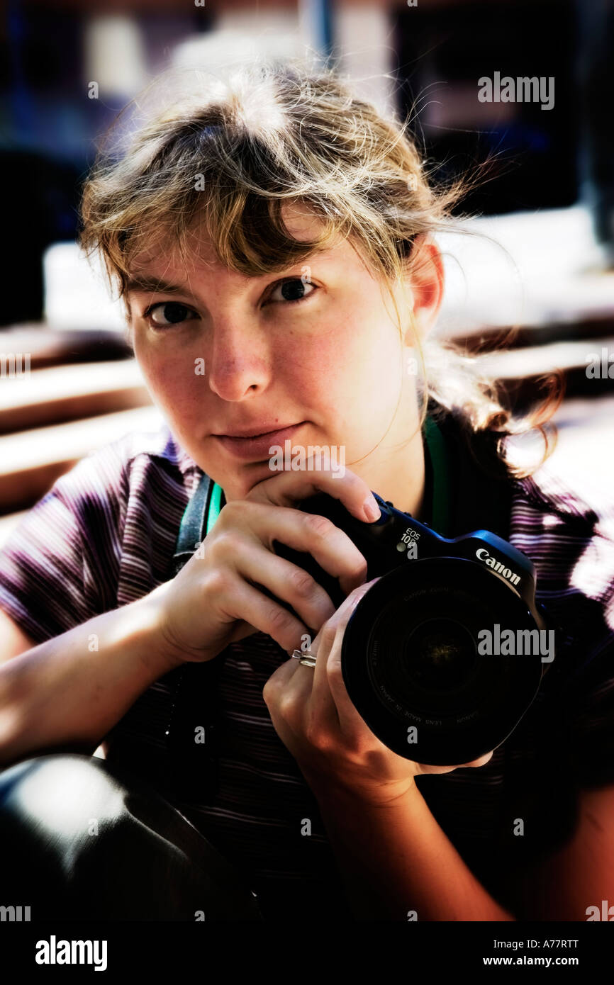 Pretty girl with a camera Stock Photo - Alamy