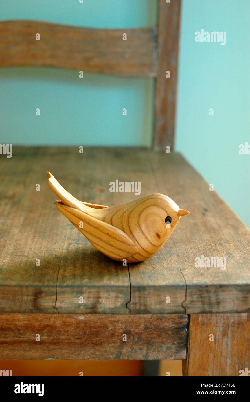 Blue interior with old chair and a little bird Stock Photo - Alamy