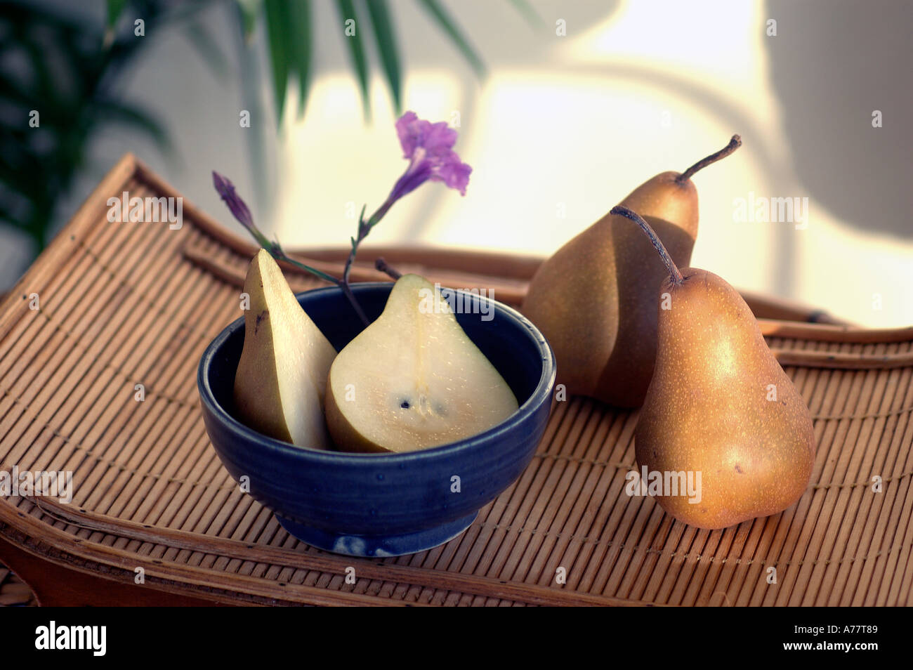 Pears with sunrise light in a tropical setting Stock Photo - Alamy