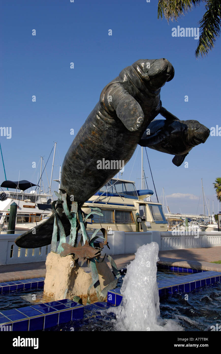 Statue of a female manatee and child on the downtown waterfront in ...