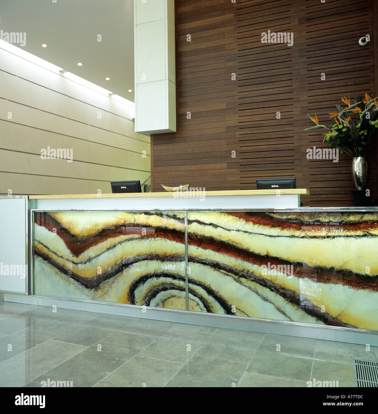 Office reception desk with stained glass panel front Stock Photo - Alamy