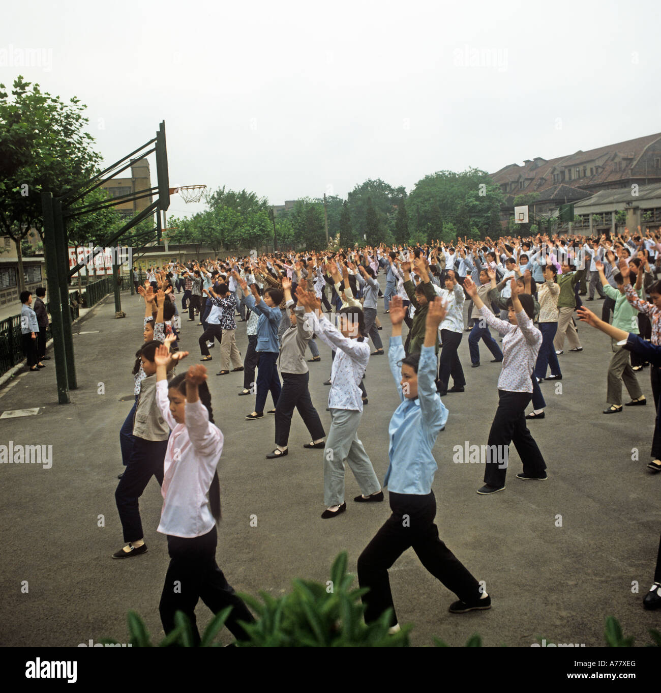 China, Shanghai, morning exercise is compulsory for these men & women ...