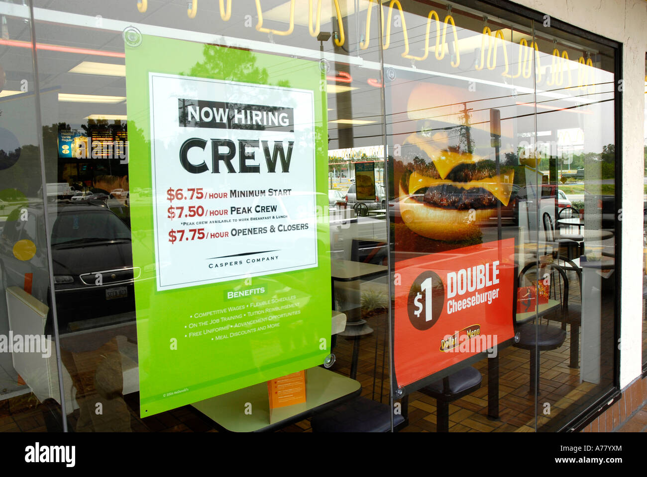 Help wanted poster posted in the window of a fast food restaurant Stock ...