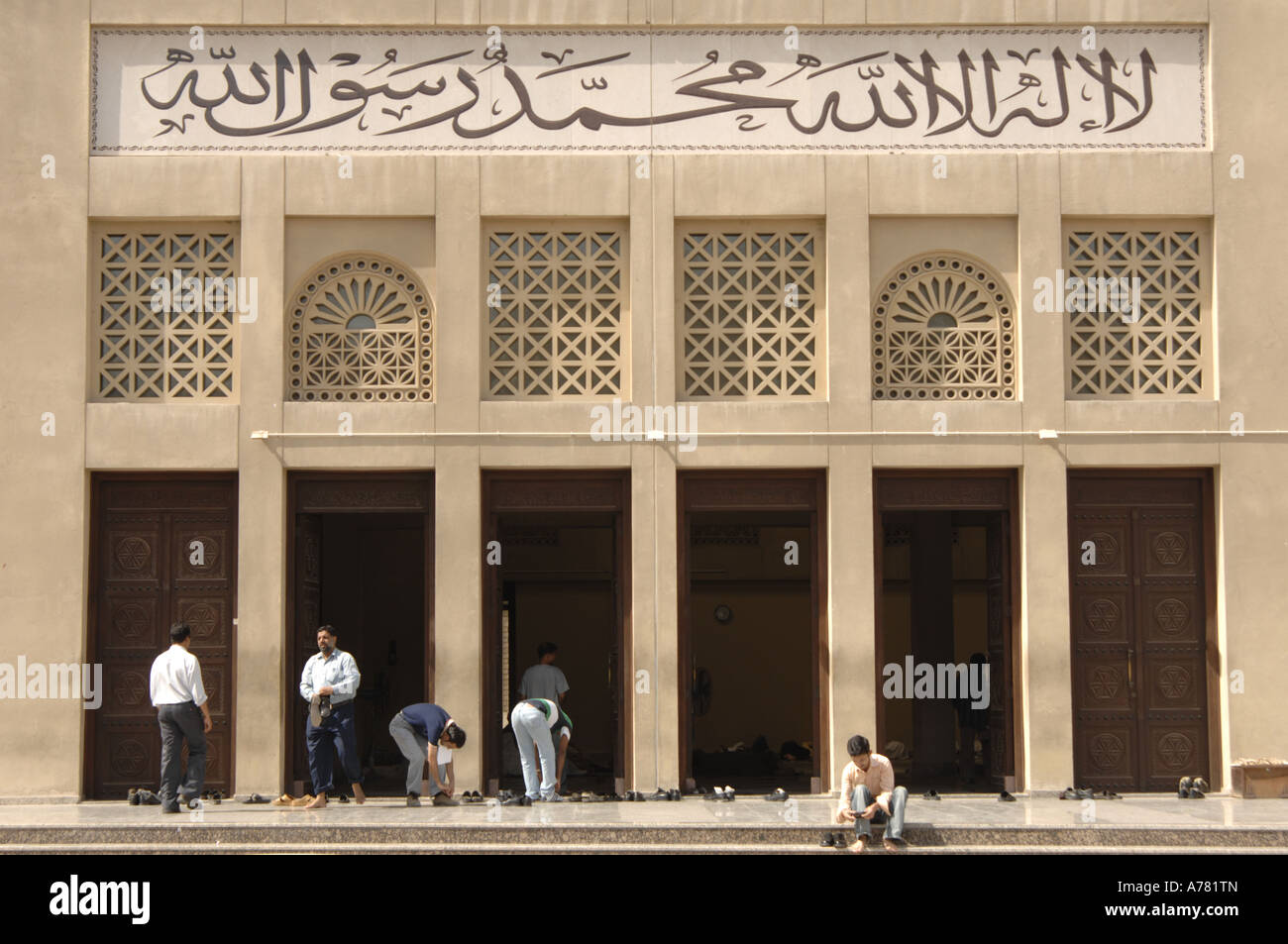 removing shoes at mosque , Dubai Stock Photo - Alamy