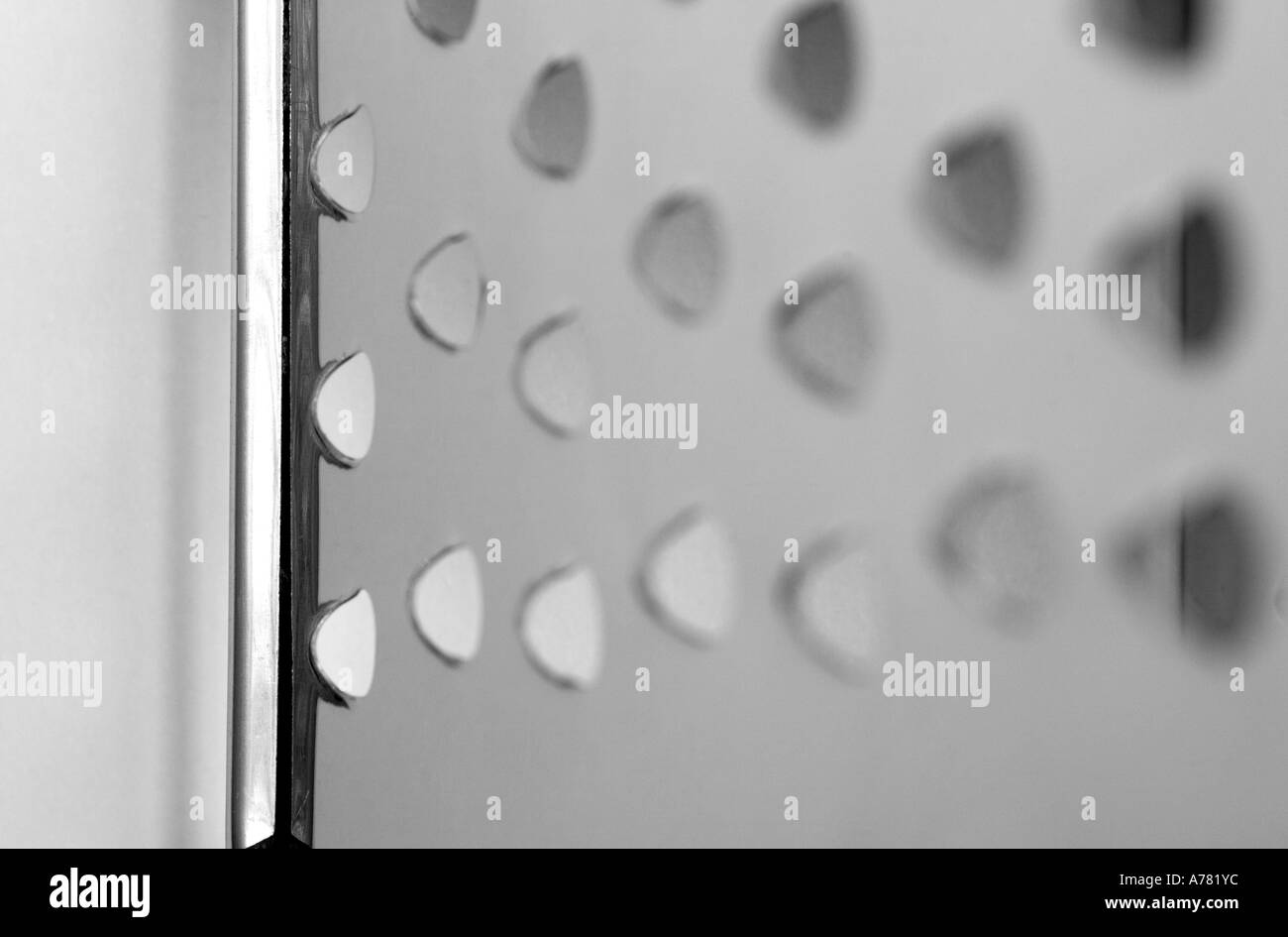 Cheese grater close up Black and White Stock Photos & Images - Alamy