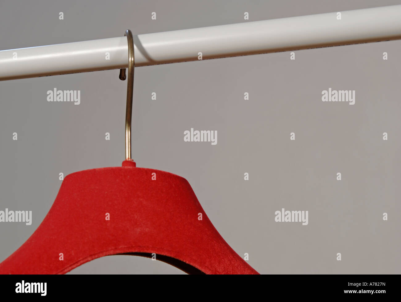 red coat hanger Stock Photo - Alamy