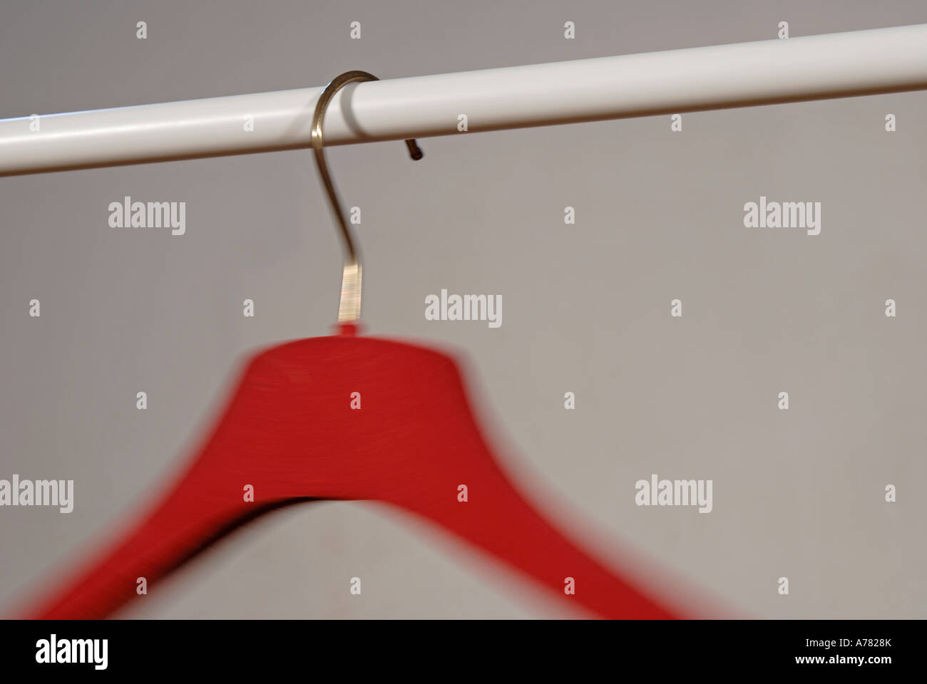 vibrating coat hanger Stock Photo - Alamy