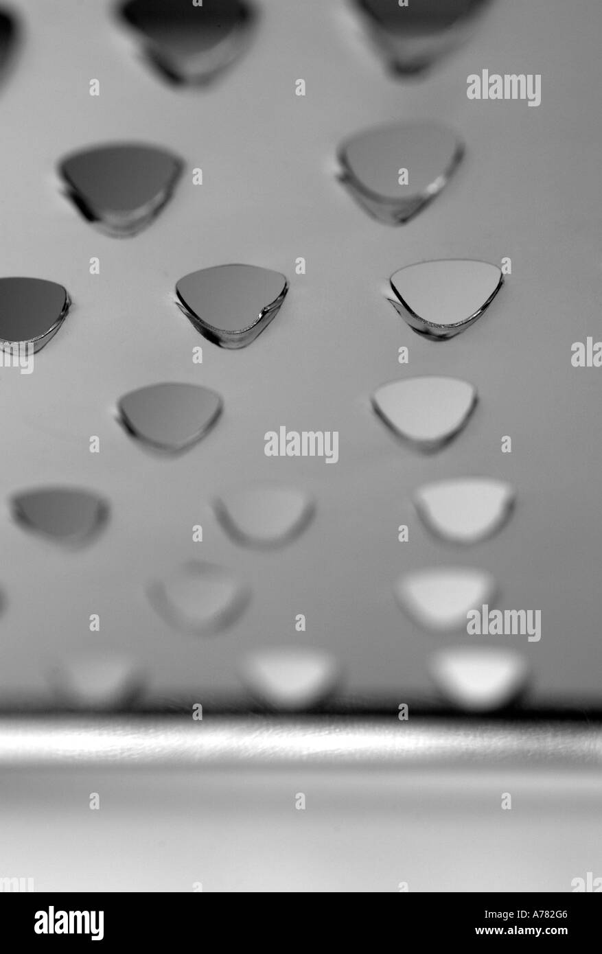 Cheese grater close up Black and White Stock Photos & Images - Alamy
