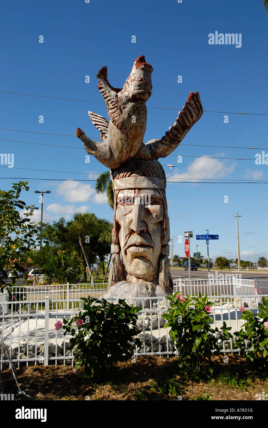 Artist wood carving of an Indian native American bust on an old tree ...