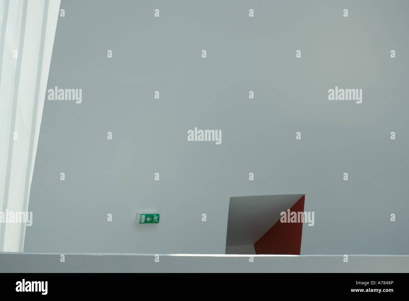 Emergency exit sign gray background hi-res stock photography and images ...