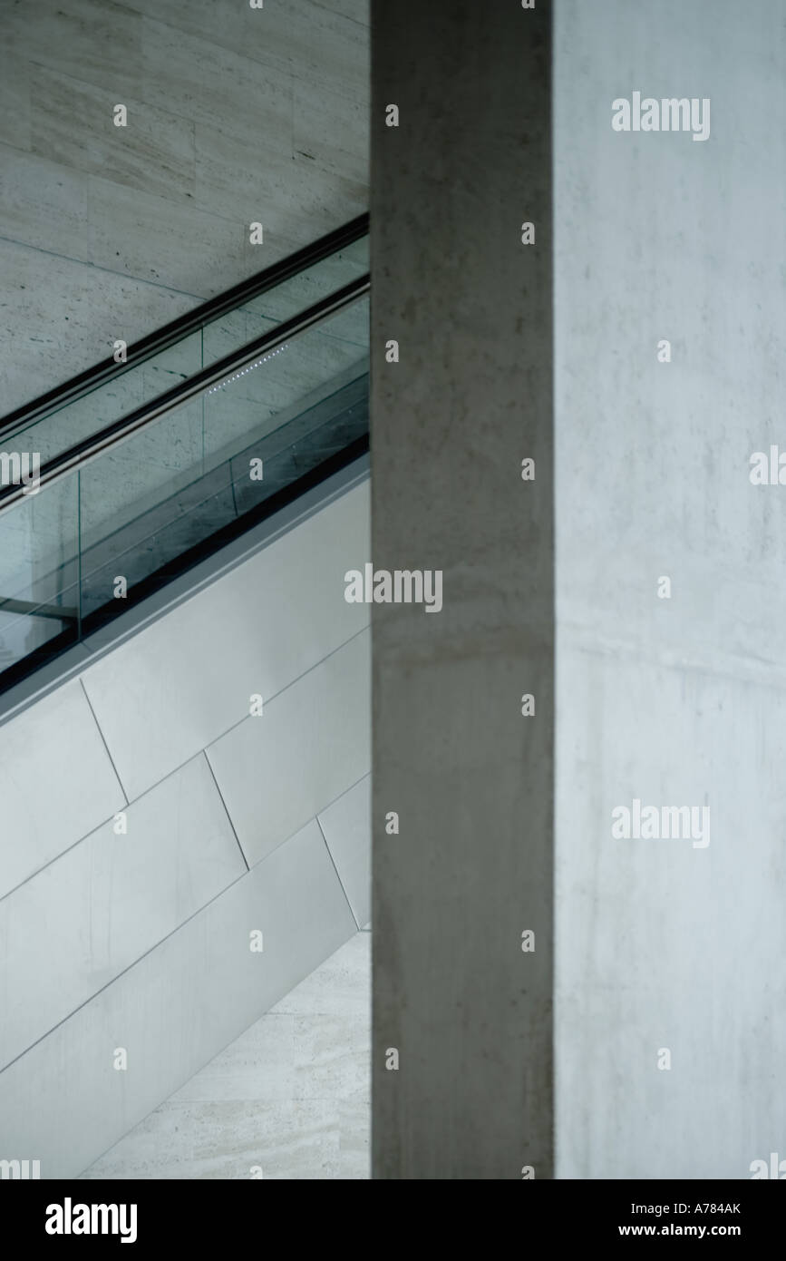 Architectural detail, concrete wall and escalator Stock Photo - Alamy