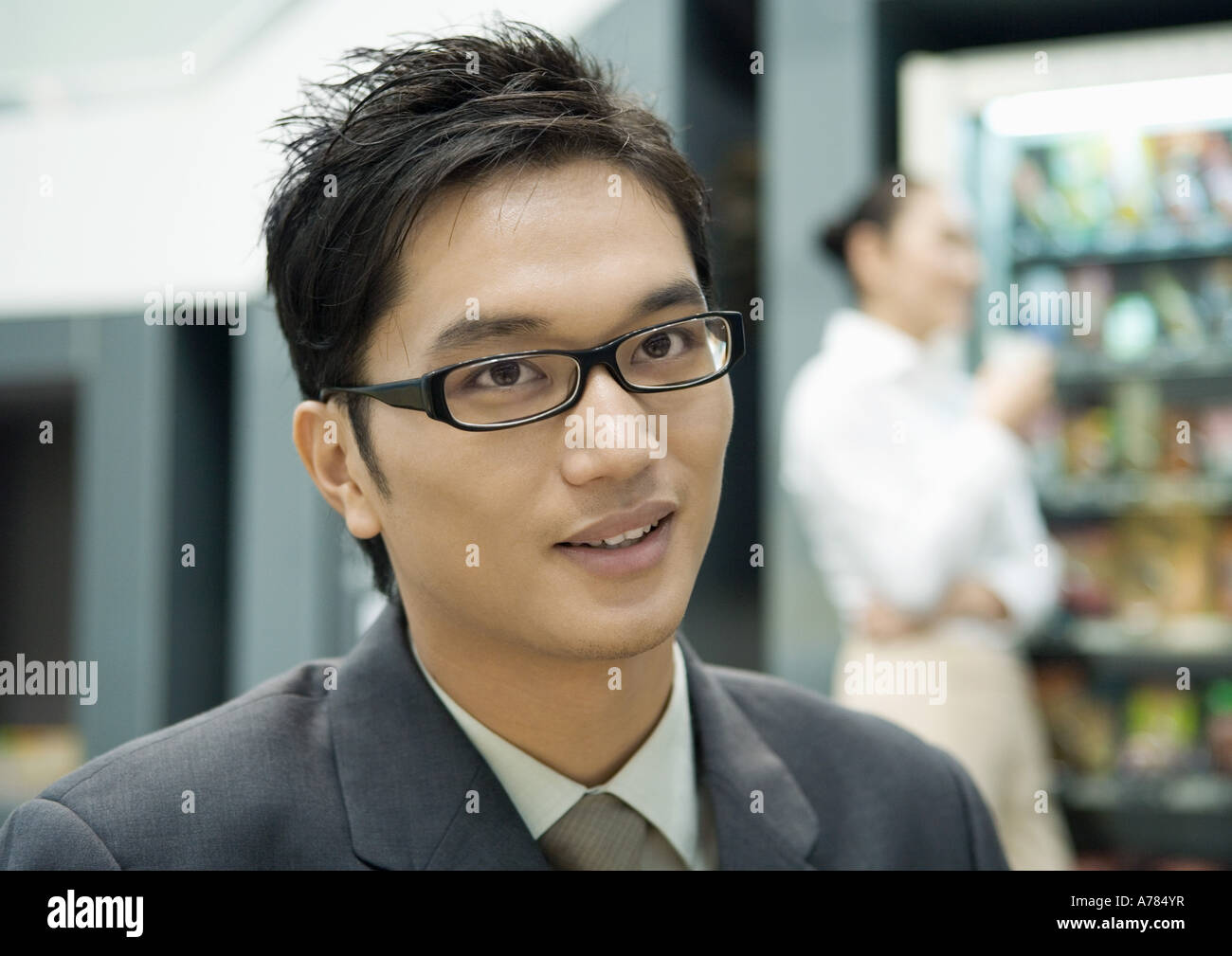 Businessman in break room, portrait Stock Photo - Alamy