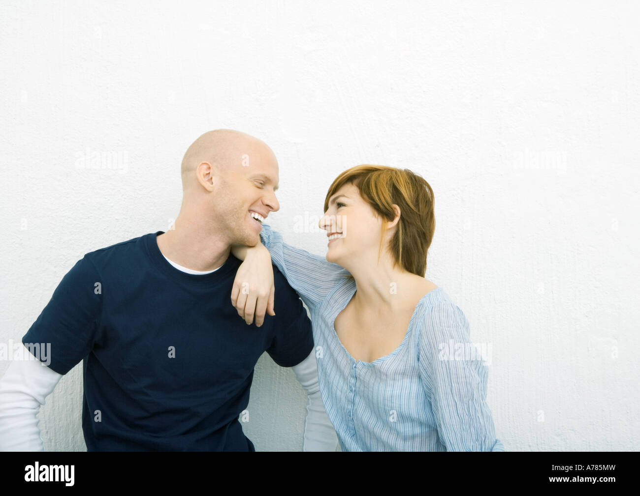 Couple mans arm around shoulder hi-res stock photography and images - Alamy