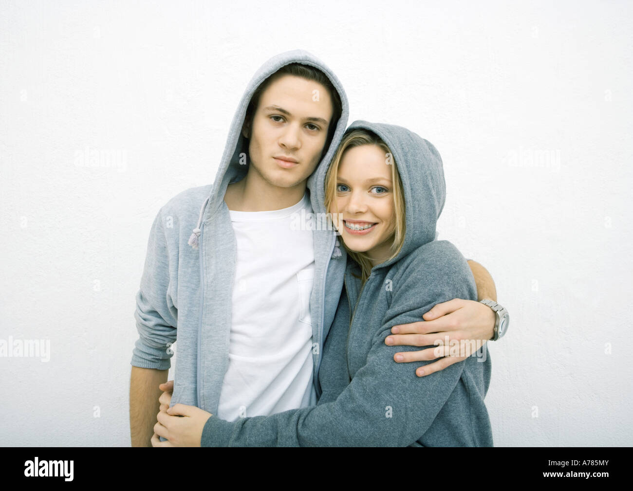 Arms around waists hi-res stock photography and images - Alamy