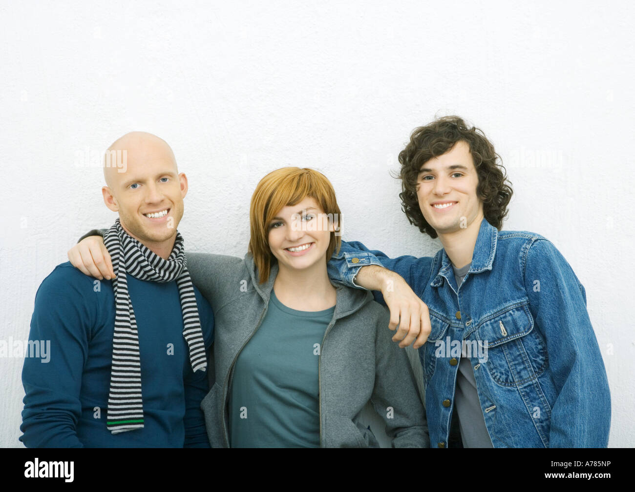 Three young adult friends, portrait Stock Photo - Alamy