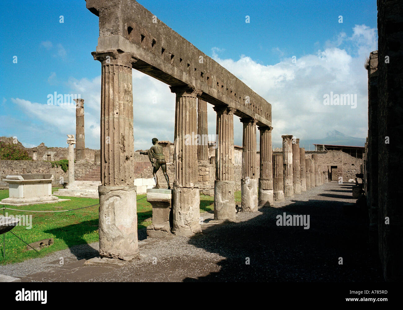 Impressive columns and a bronze statue in the ancient Roman city of ...