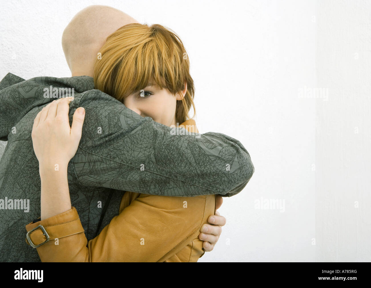Woman arm around mans shoulder hi-res stock photography and images - Alamy
