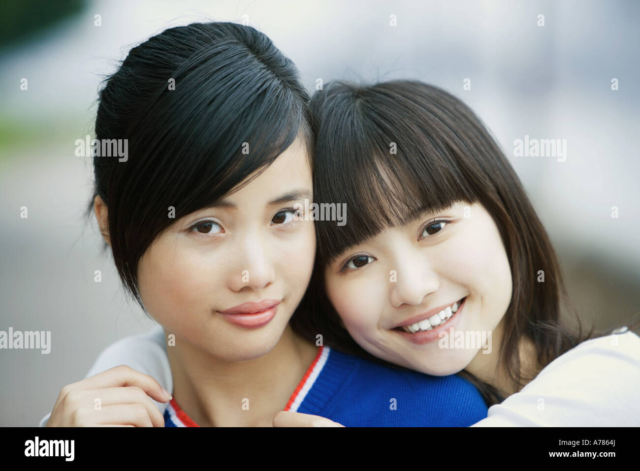 Putting arm around shoulder hi-res stock photography and images - Alamy