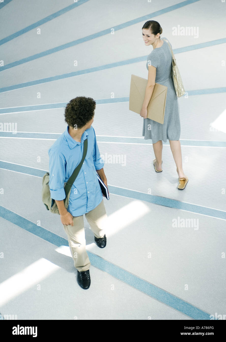 Man Carrying Woman Over Shoulder Stock Photos & Man Carrying Woman Over ...