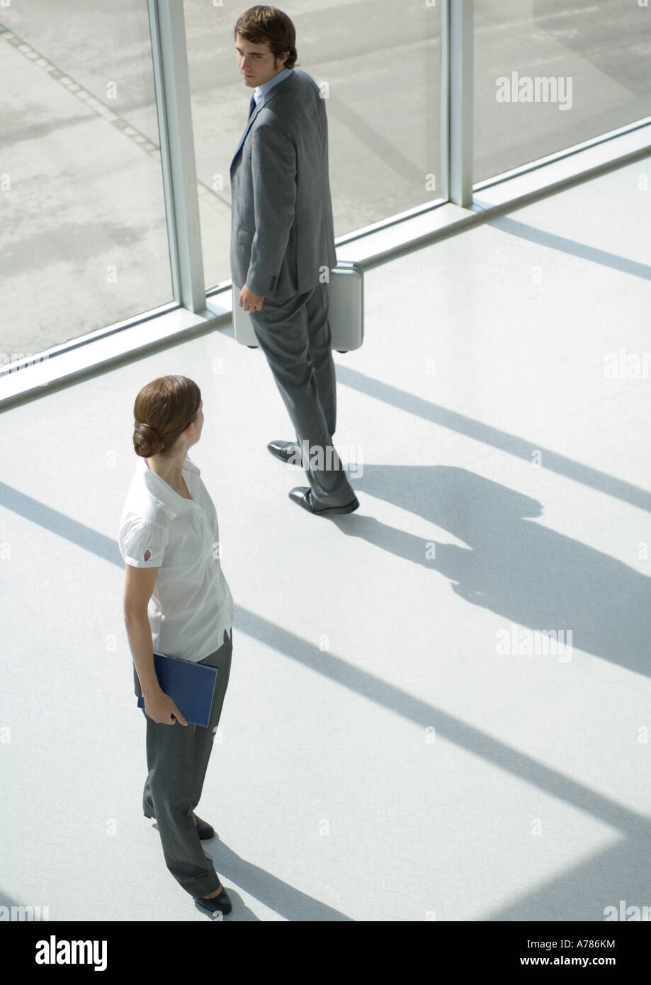 Man carrying woman over shoulder hi-res stock photography and images ...