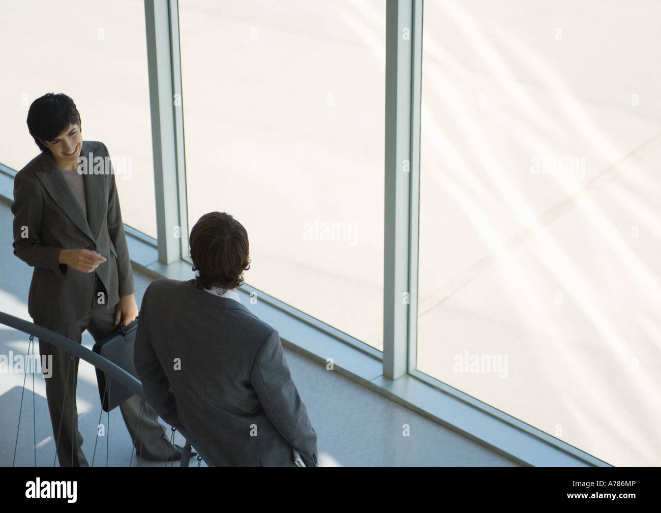 Business people talking from overhead hi-res stock photography and ...