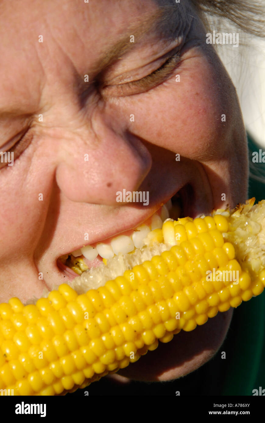 Woman Eats Ear of Corn Cob at Strawberry Festival Plant City Florida FL ...