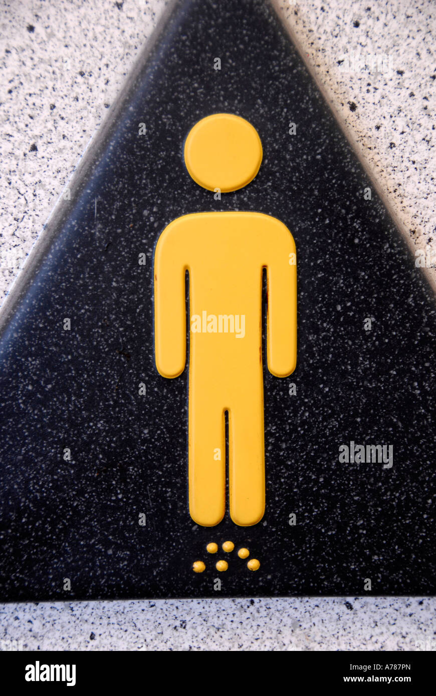 International symbol for a restroom with brailed letters Stock Photo ...