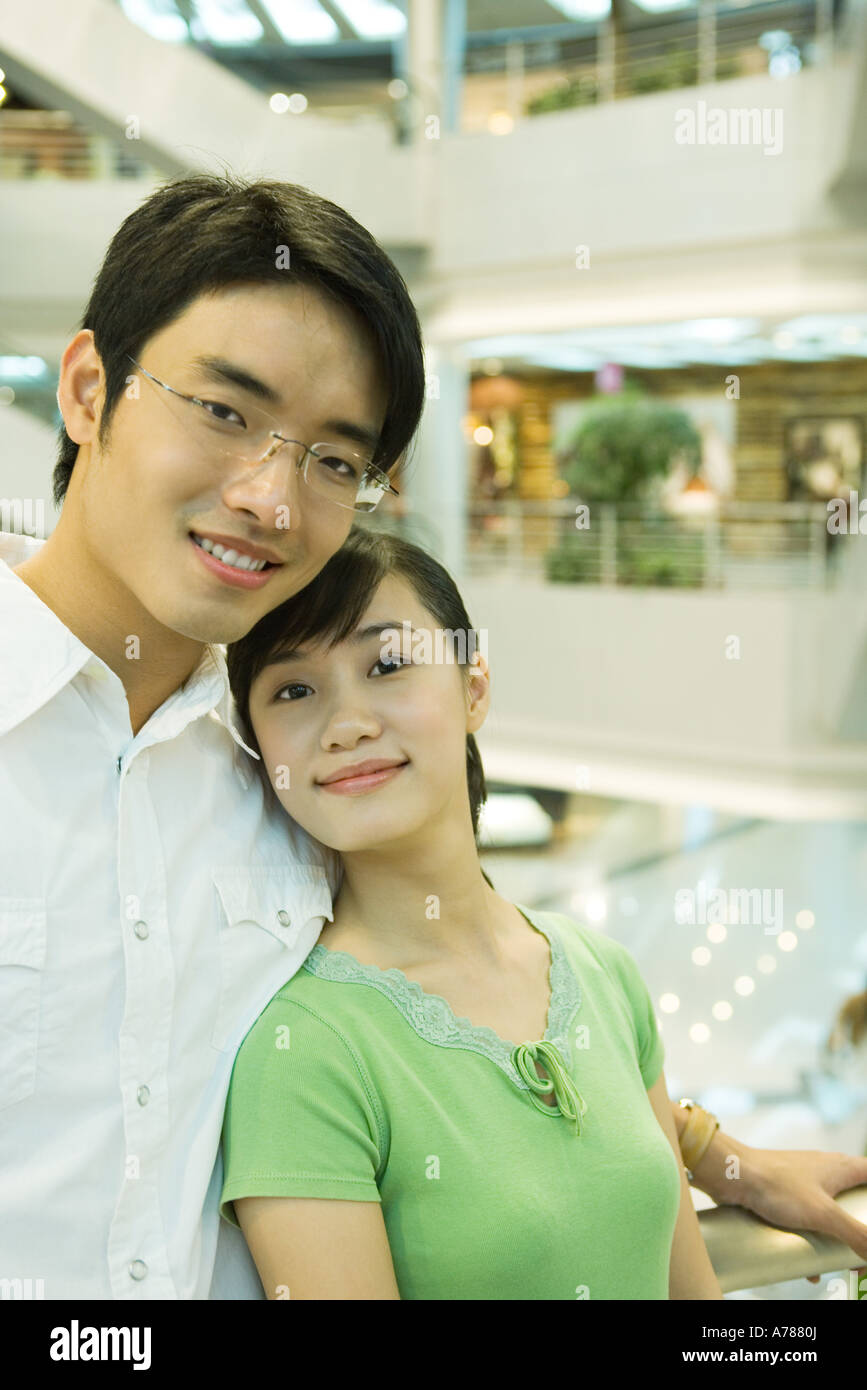 Couple in mall, portrait Stock Photo - Alamy