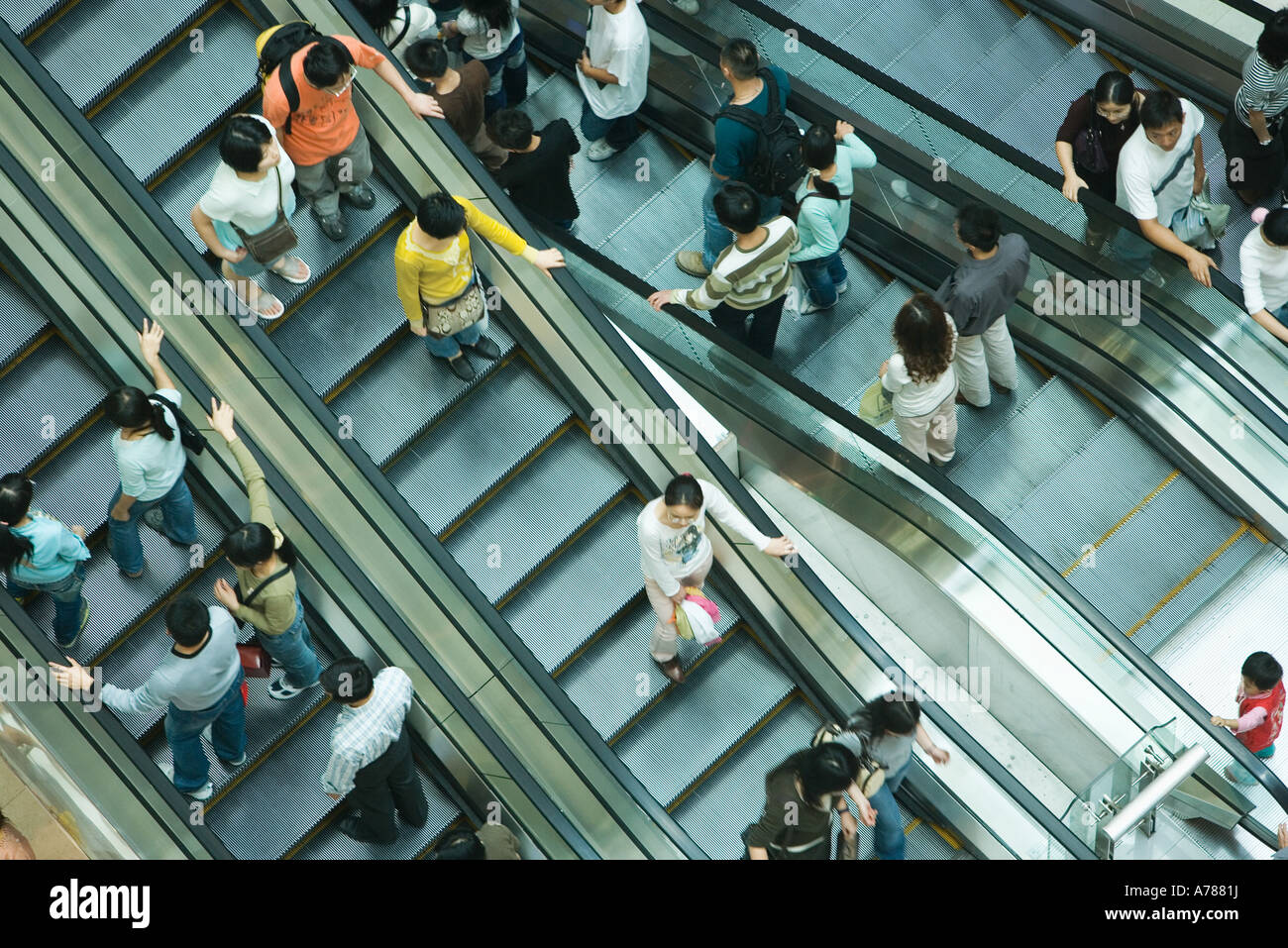 People taking escalators, high angle view Stock Photo - Alamy