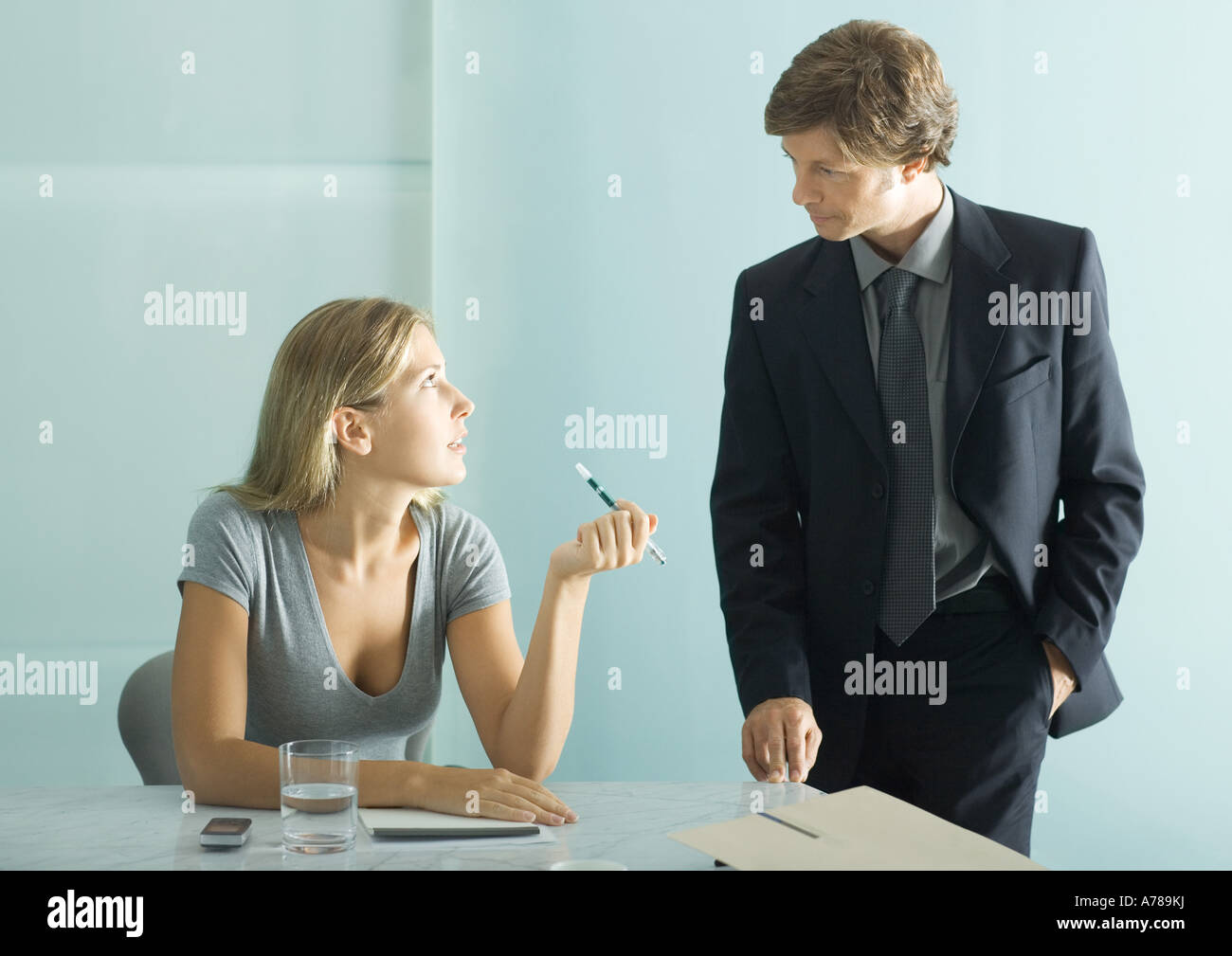 Two business colleagues having conversation Stock Photo - Alamy Two business colleagues having conversation Stock Photo - Alamy