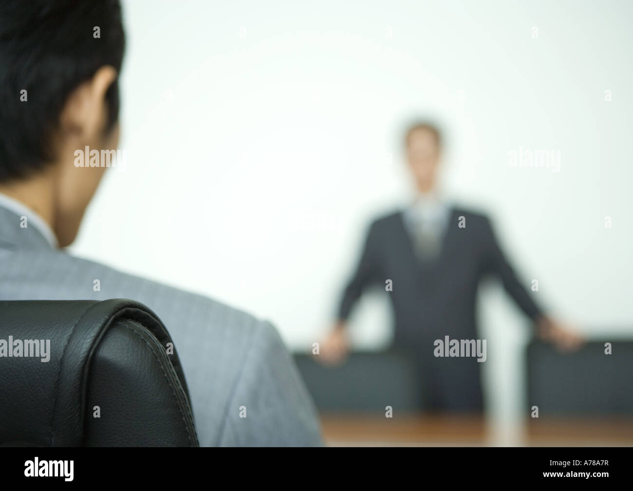 Two men sitting across the desk hi-res stock photography and images - Alamy