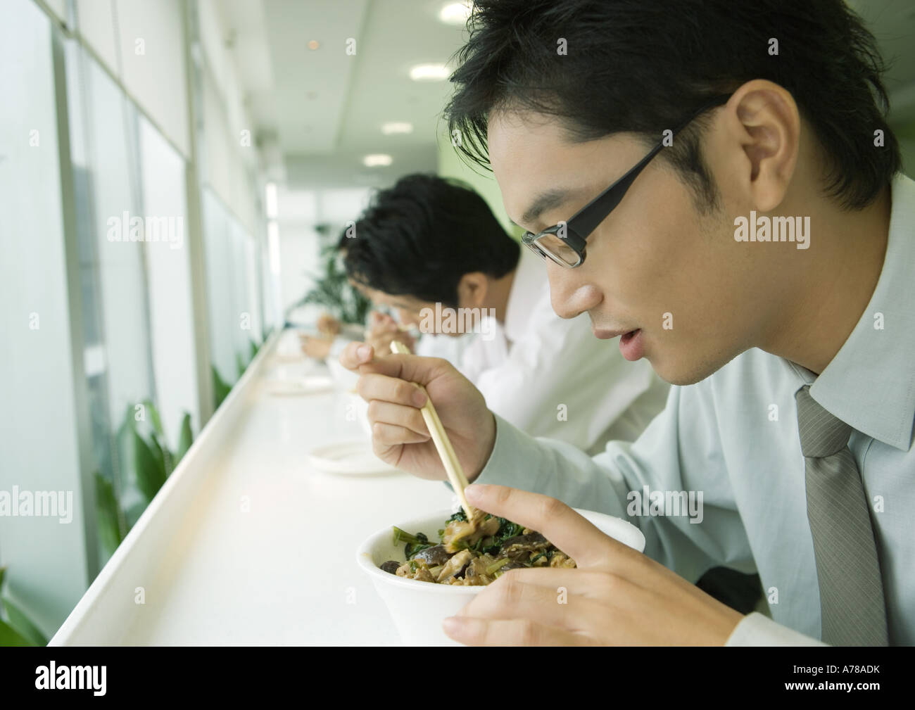 Business executives eating in cafeteria Stock Photo - Alamy