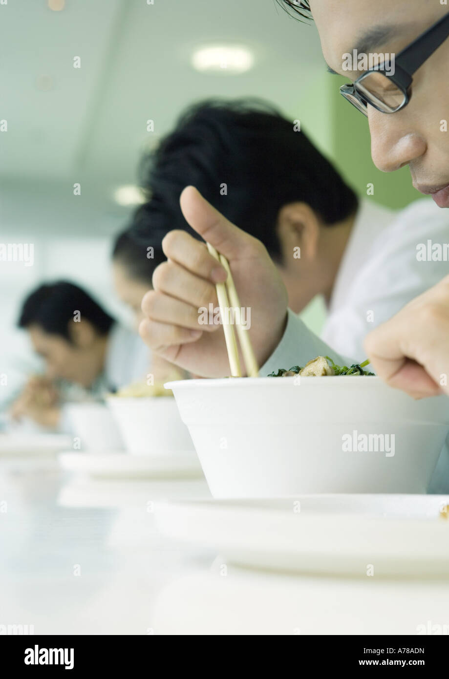 Business executives eating in cafeteria Stock Photo - Alamy