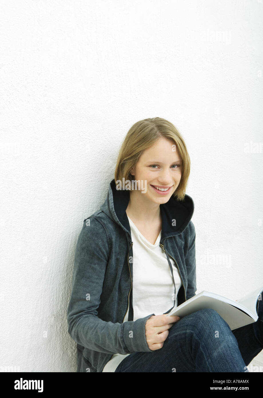 Teenage girl reading, portrait Stock Photo - Alamy
