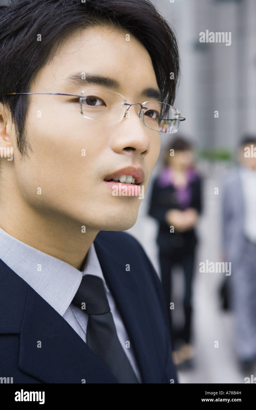 Businessman, three quarter angle, portrait Stock Photo - Alamy