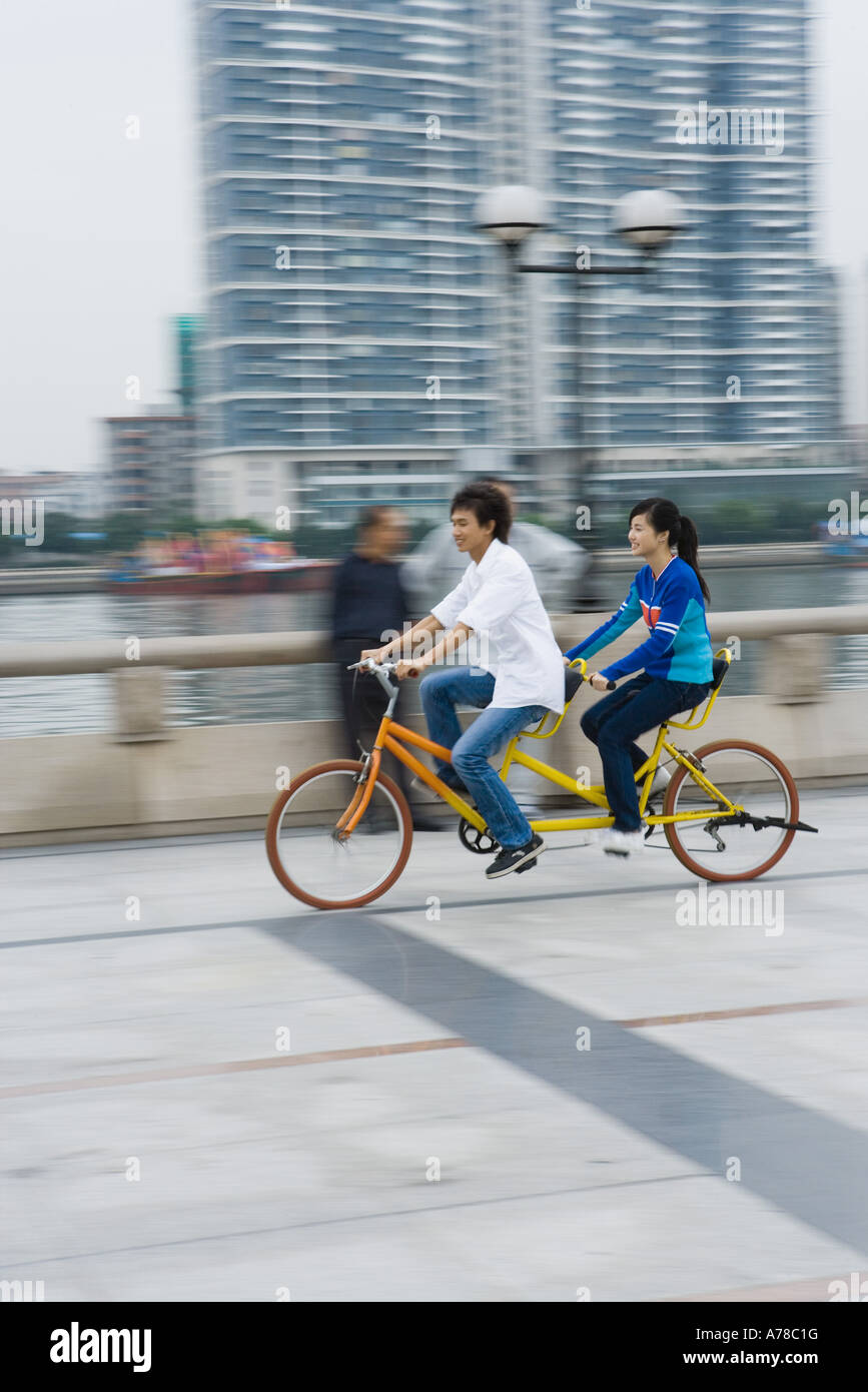 Two women on tandem bicycle hi-res stock photography and images - Alamy