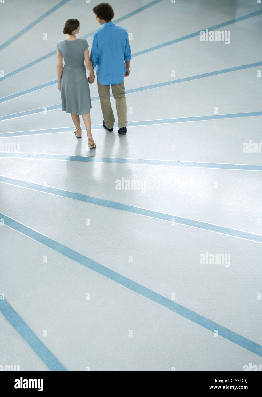 Young couple, rear view, full length Stock Photo - Alamy