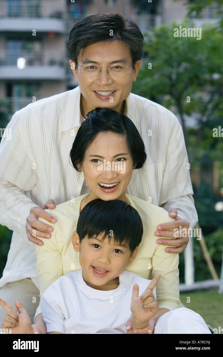Family, smiling at camera, portrait Stock Photo - Alamy