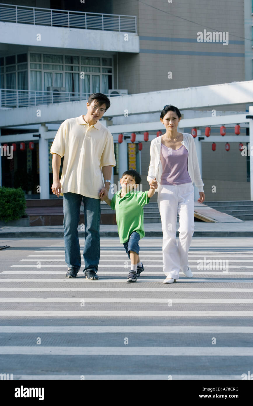 Hold hands crossing the crosswalk hi-res stock photography and images ...