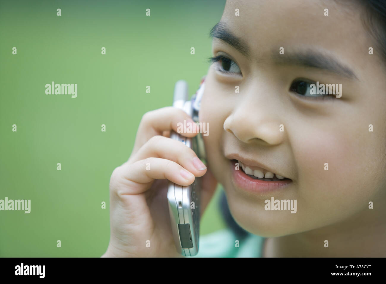 Little girl using cell phone, close-up Stock Photo - Alamy