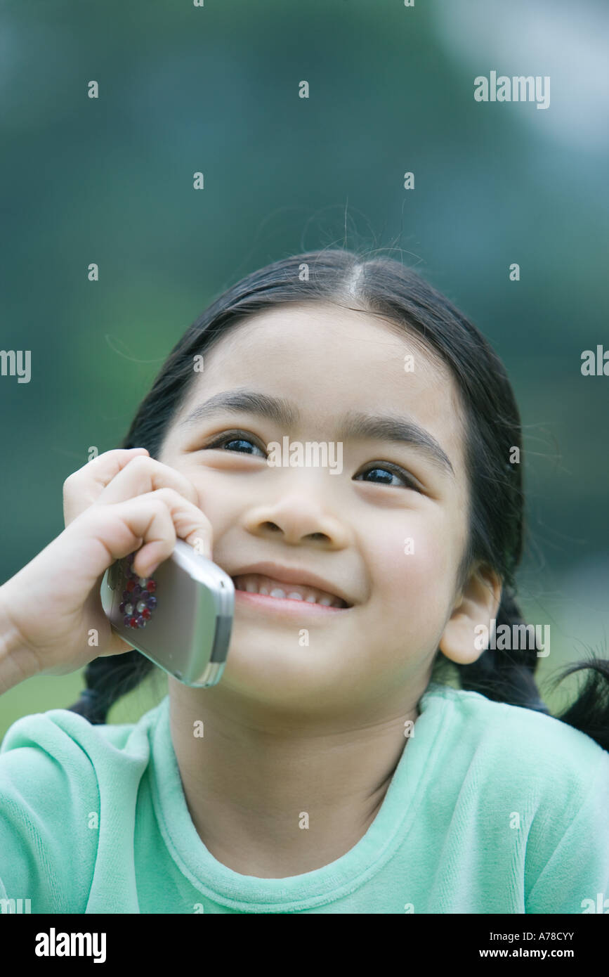 Little girl using cell phone, close-up Stock Photo - Alamy