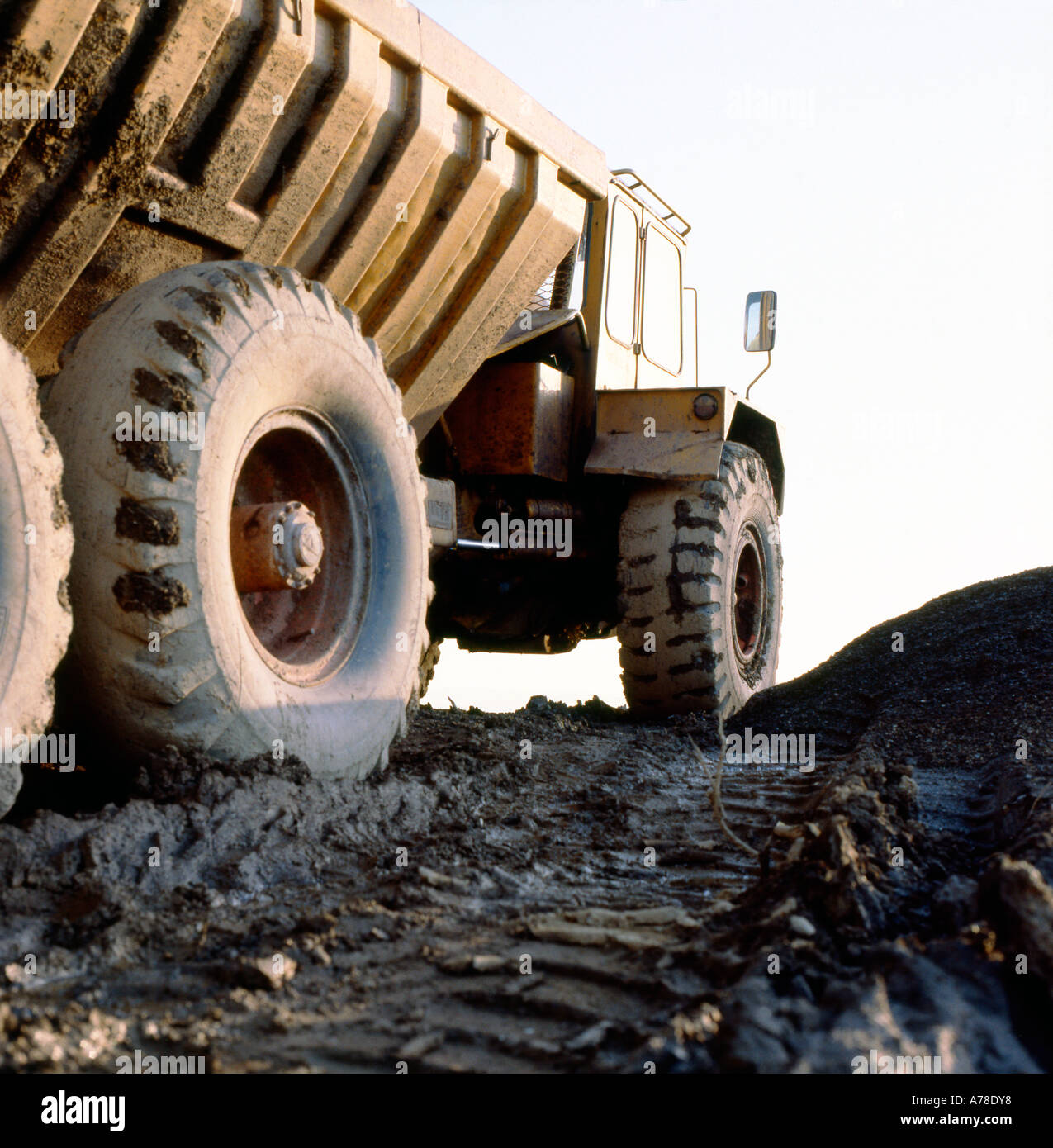 Yellow earth moving trucks hi-res stock photography and images - Alamy
