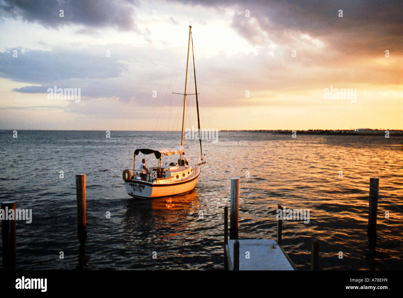 Sailboat Leaving Dock Stock Photo - Alamy