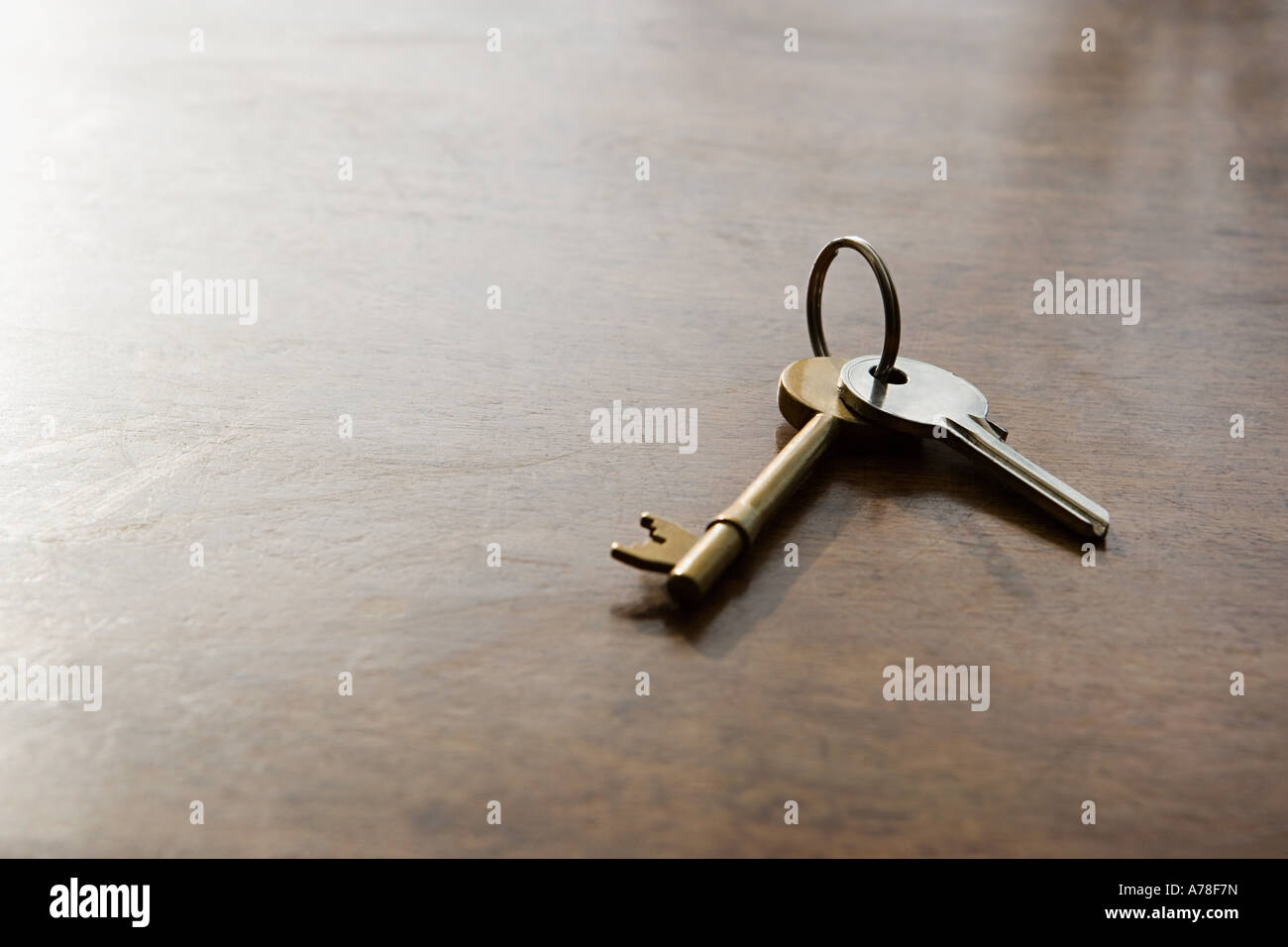 Keys on a table Stock Photo - Alamy