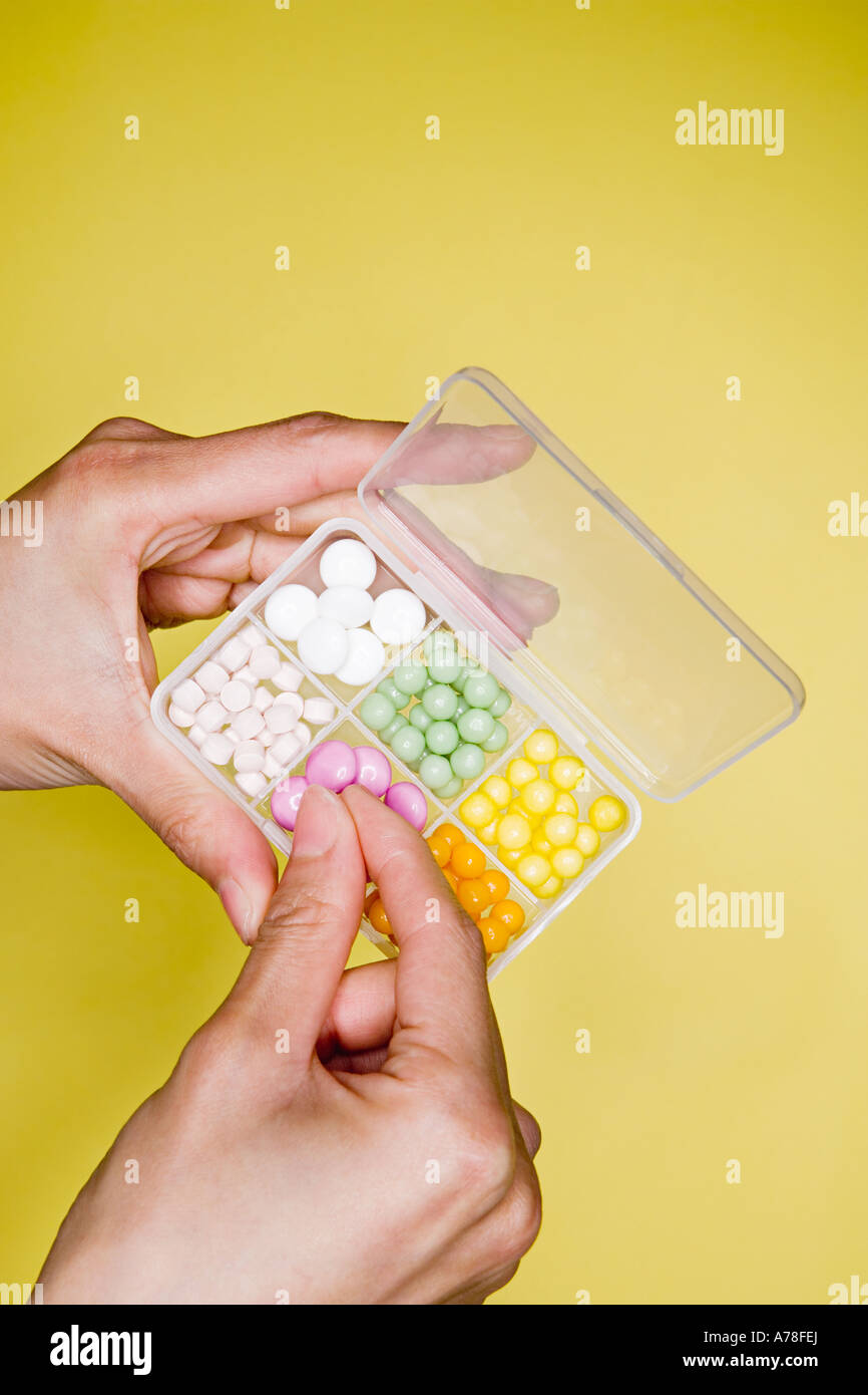 Person with box of tablets Stock Photo - Alamy