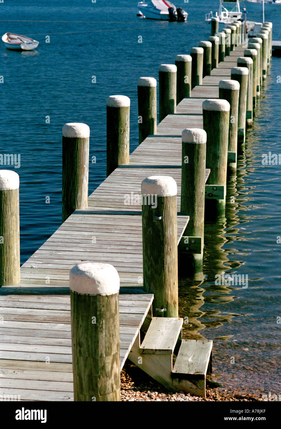 A traditional boat jetty on the coast of Cape Cod, Massachusetts, USA ...