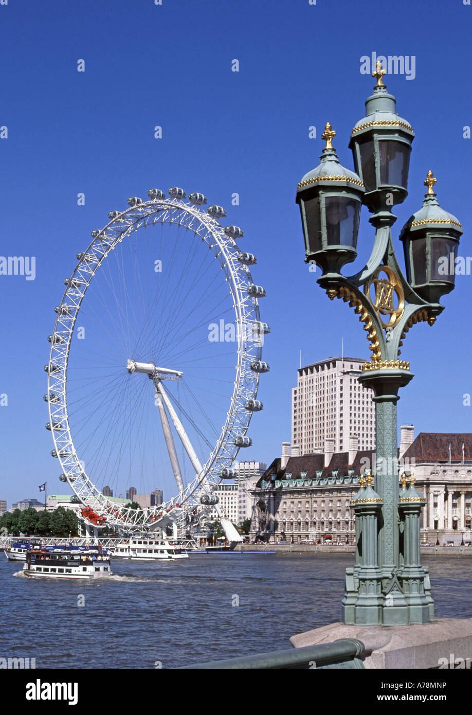 London Westminster Bridge ornate three lamp cluster on parapet with ...