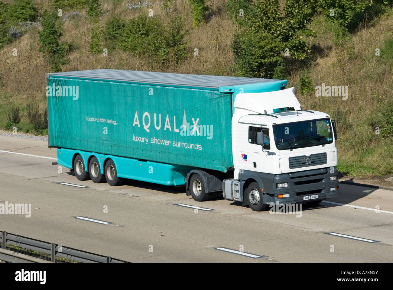 M25 motorway articulated trailer & MAN lorry Stock Photo - Alamy